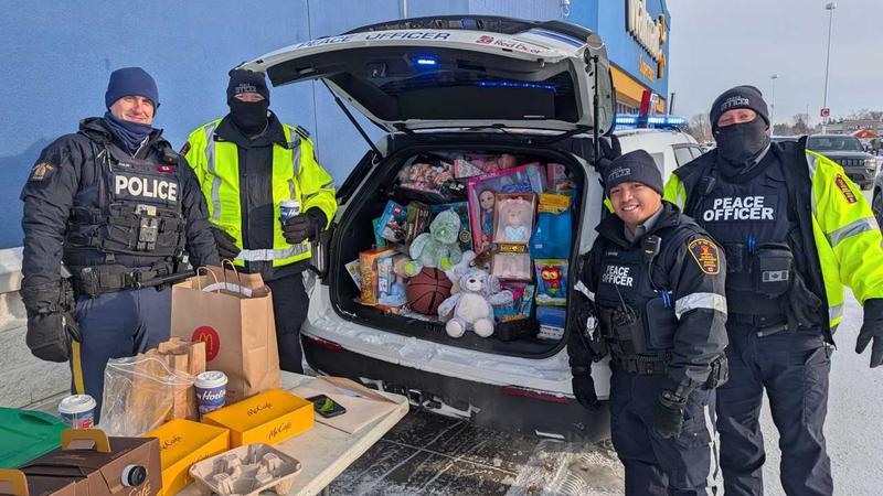 Red Deer RCMP and peace officers ‘cram the van’ for Ronald McDonald ...